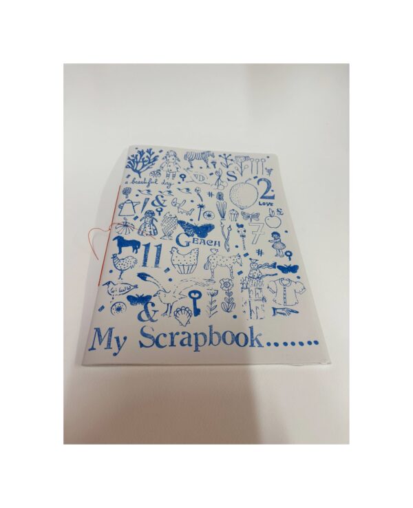 Scrapbook with blue stamp